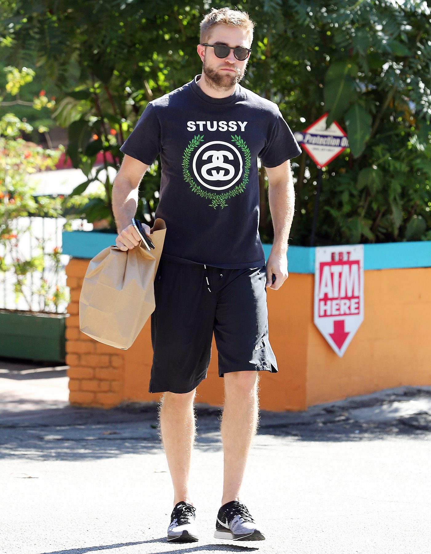 Robert Pattinson Looks Buff in Tight T-Shirt in Hollywood