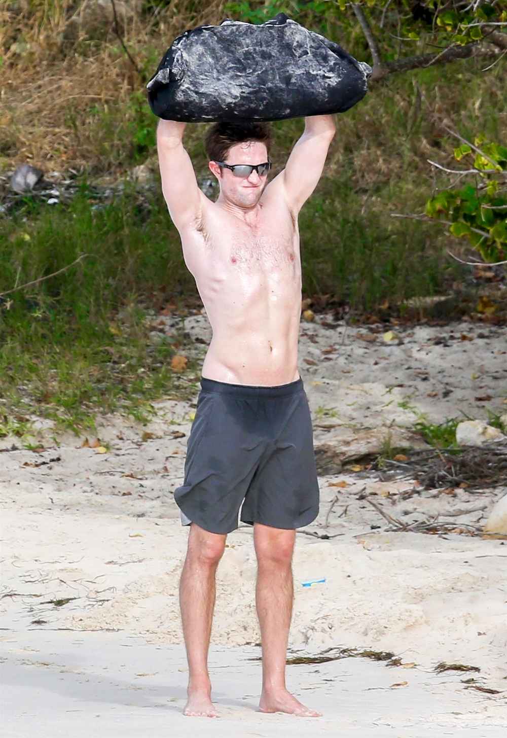 Robert Pattinson Does Shirtless Workout on Antigua Beach: Pics | Us Weekly