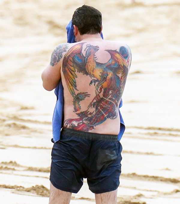 Ben Affleck Speaks Out About His ‘Garish’ Back Tattoo | Us Weekly