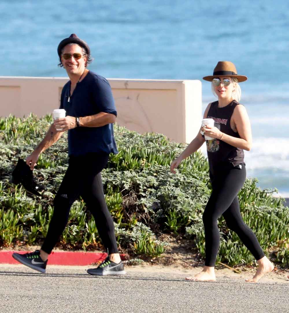 Lady Gaga, Fiance Christian Carino Cuddle on Malibu Beach | Us Weekly