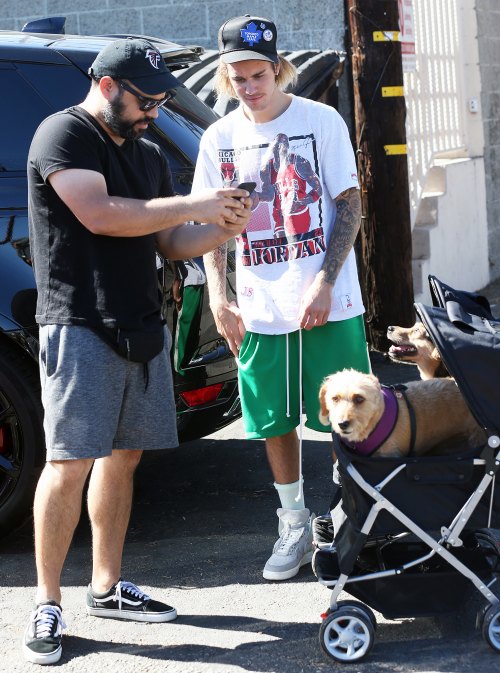 Justin Bieber Poses With Two Adorable Dogs in a Baby Stroller | Us Weekly