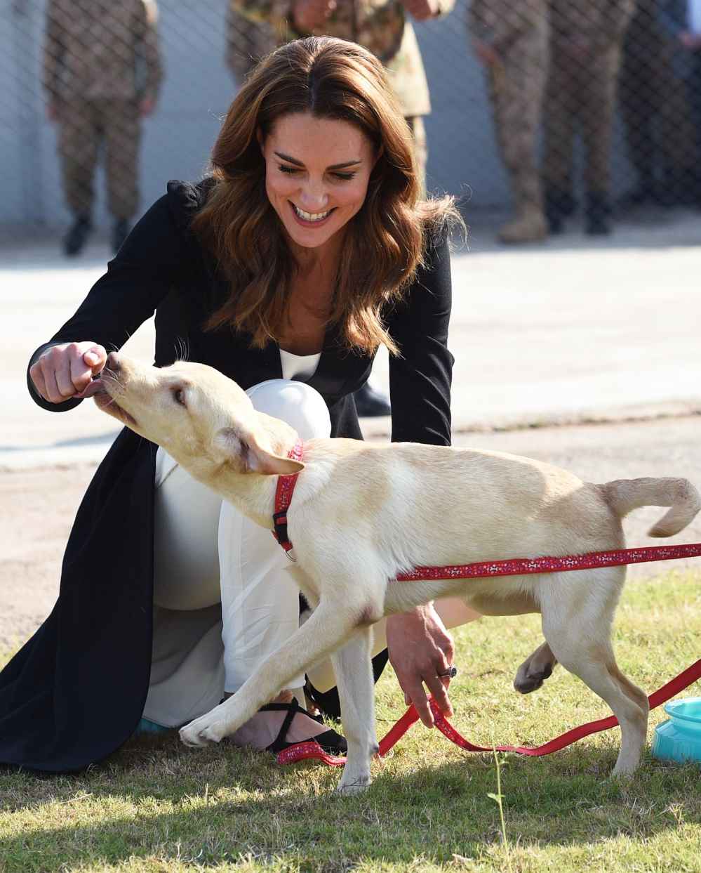 Duchess Kate, Prince William Play With Pups on Last Day in Pakistan ...