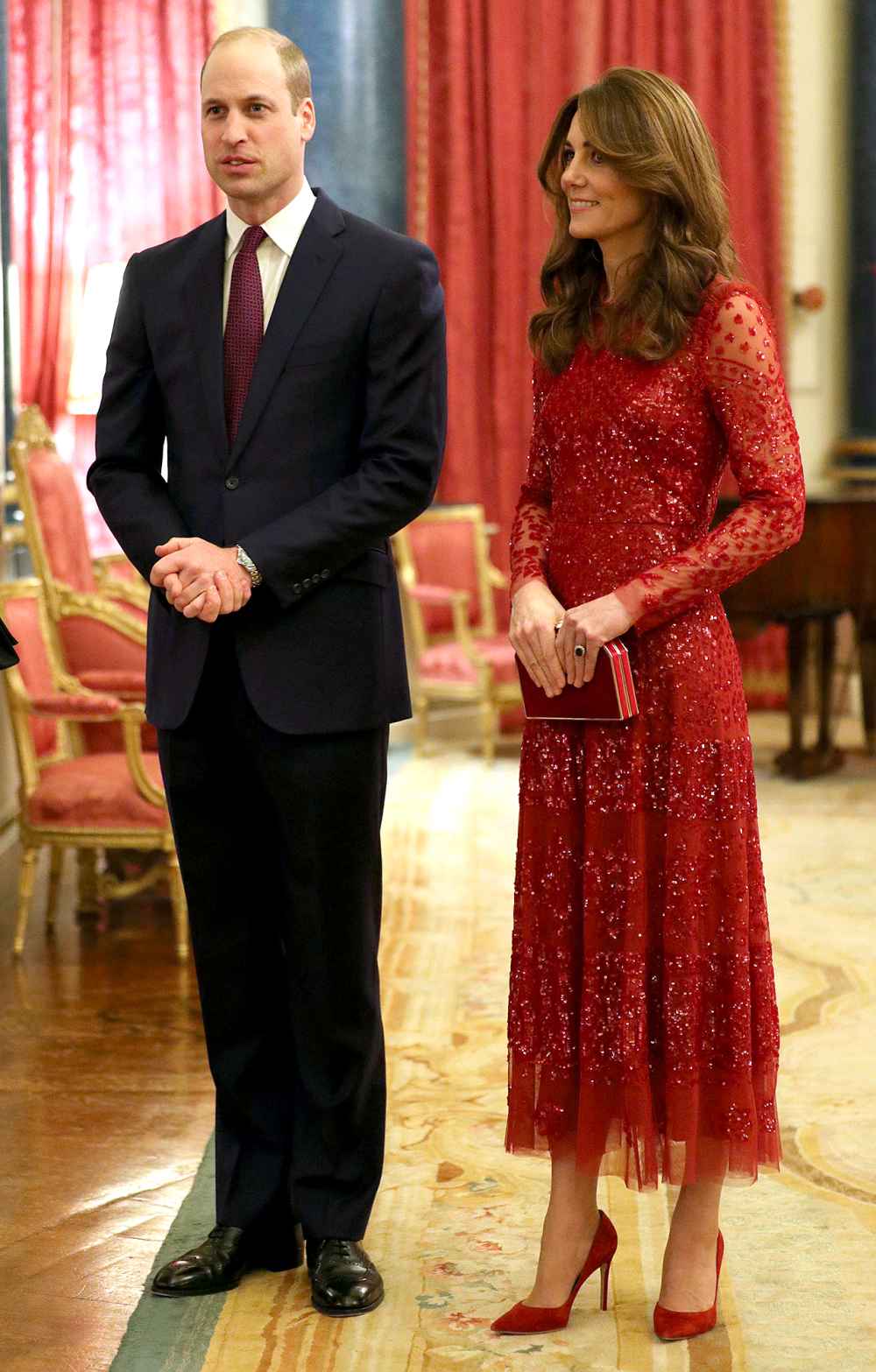 Prince William, Duchess Kate Smile at Buckingham Palace Event