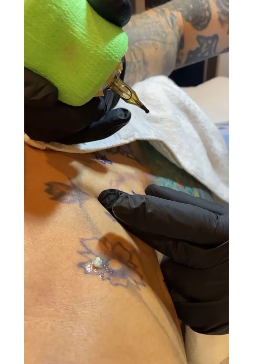 Cardi B Adds to Her Back Tat, Reveals the Pain 'Takes Your Breath Away ...
