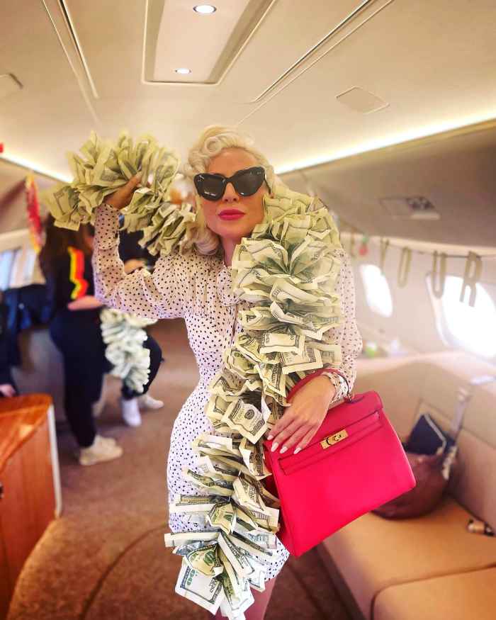 Lady Gaga Wear Boa Made of $100 Bills on Private Jet: Pics | Us Weekly