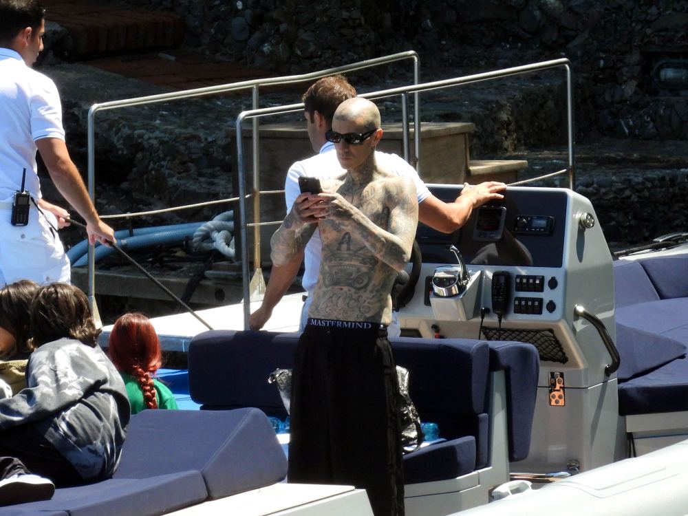 Kourtney Kardashian, Travis Barker Arrive in Italy for 3rd Wedding | Us ...