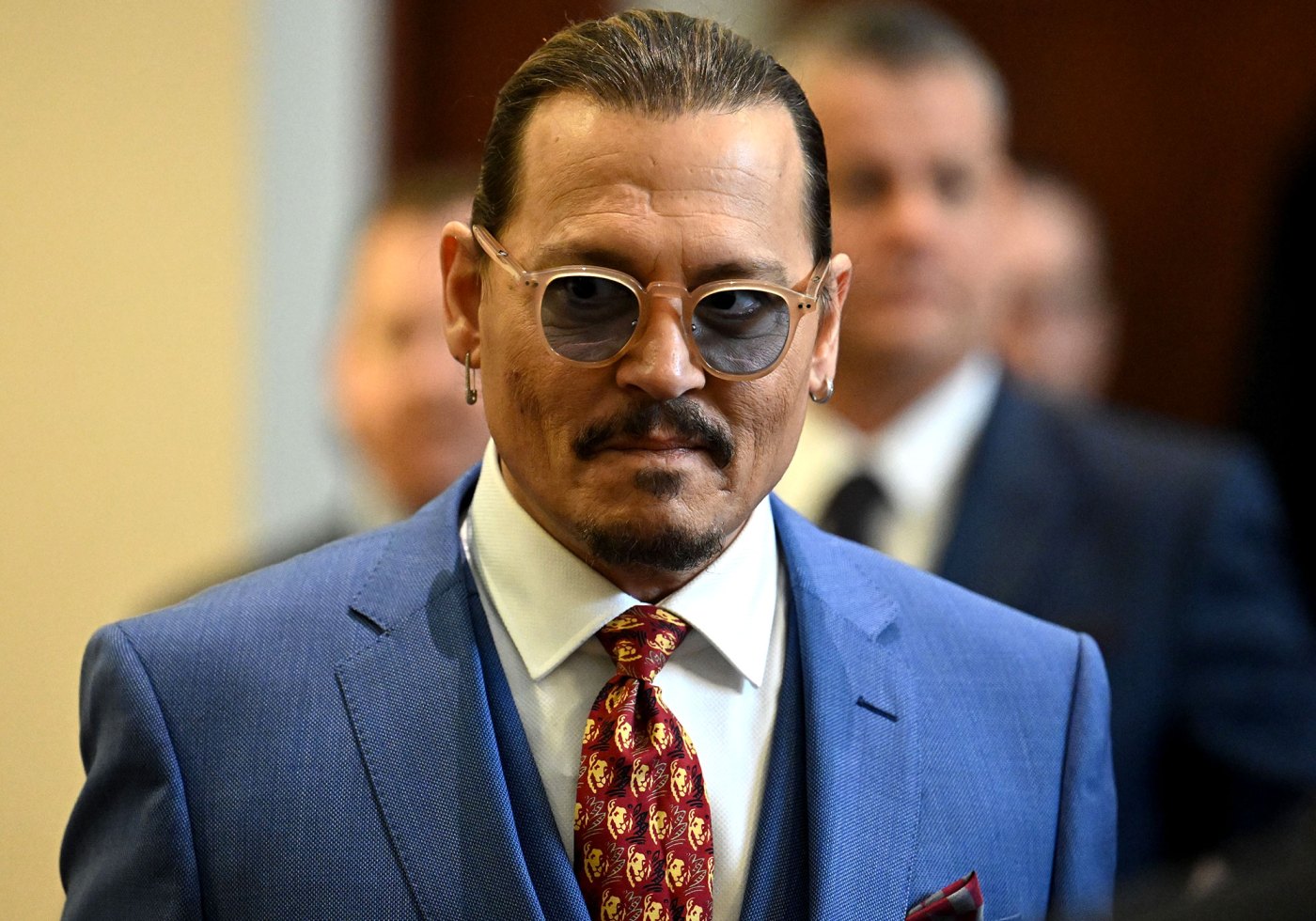 Woman Claims Johnny Depp Fathered Her Baby in Trial Outburst | Us Weekly