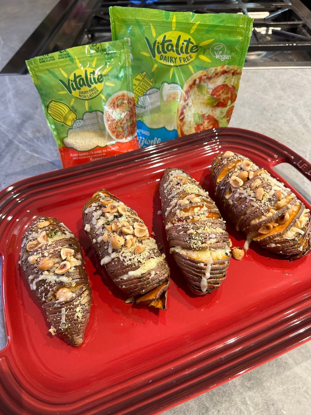 Laura Prepon Shares Cheesy Hasselback Sweet Potatoes Recipe | Us Weekly