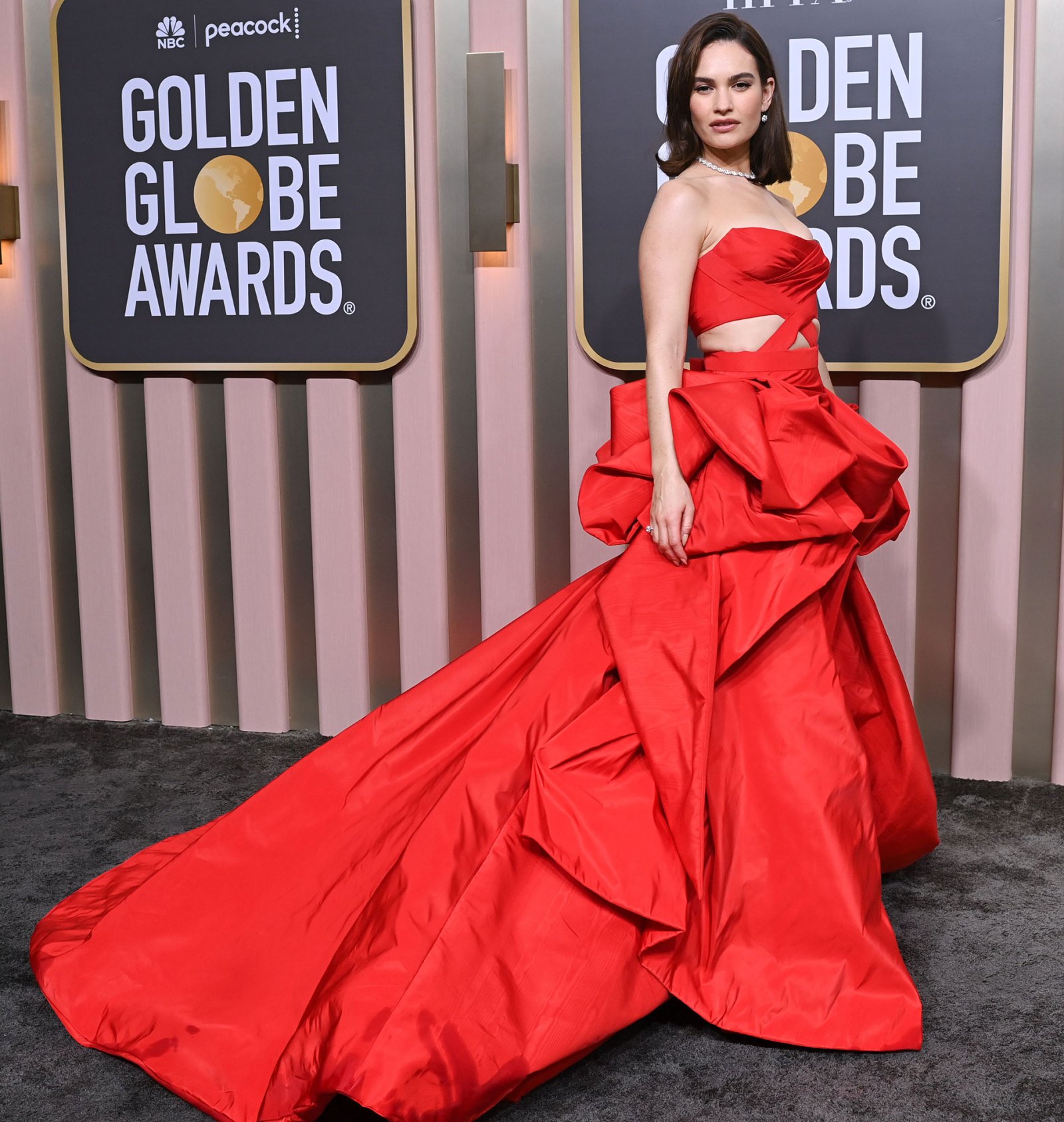 Golden Globes 2023: Lily James Turns Up the Heat in Versace | Us Weekly