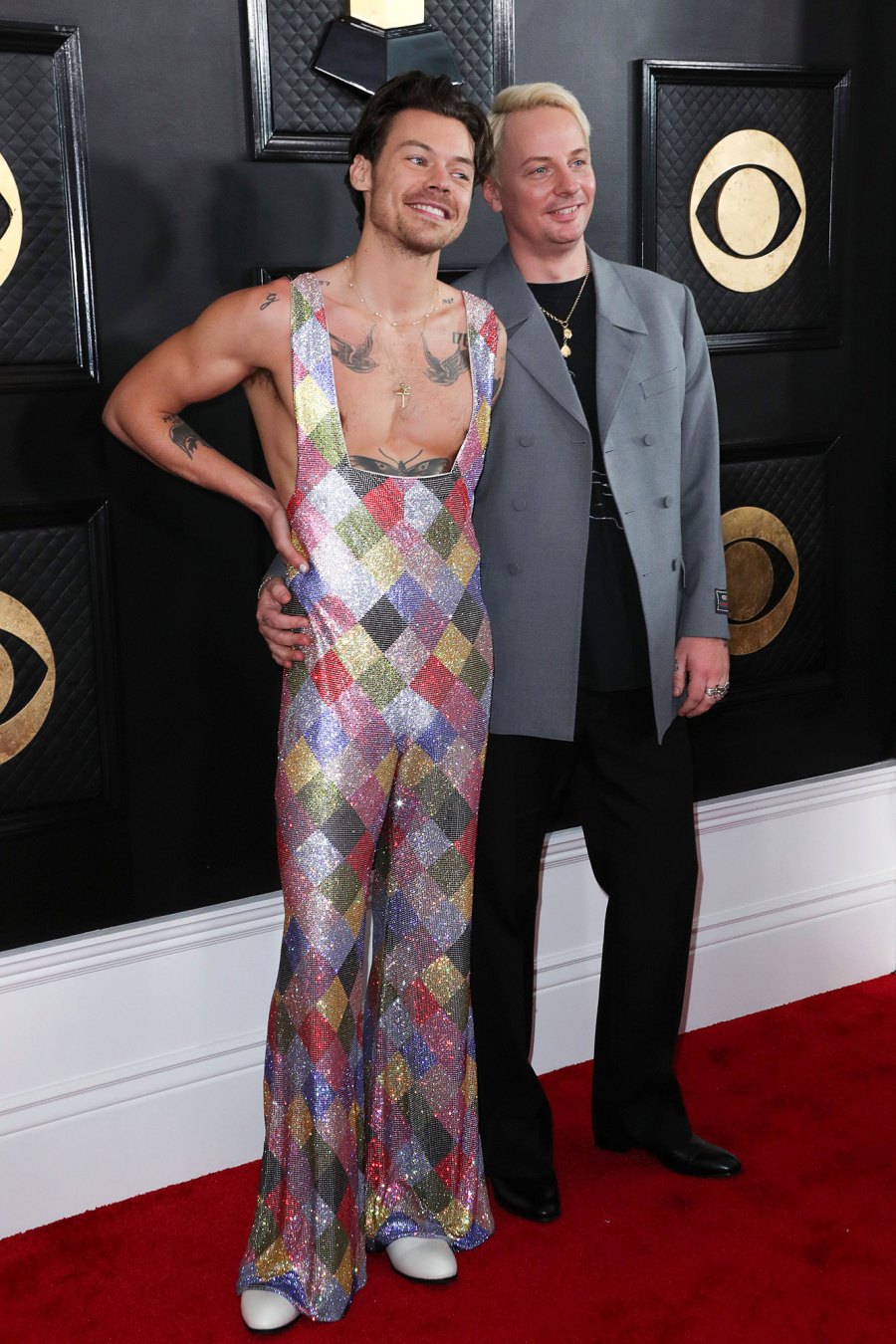 Grammys 2023: Harry Styles Shines on Red Carpet in Rainbow Jumpsuit ...