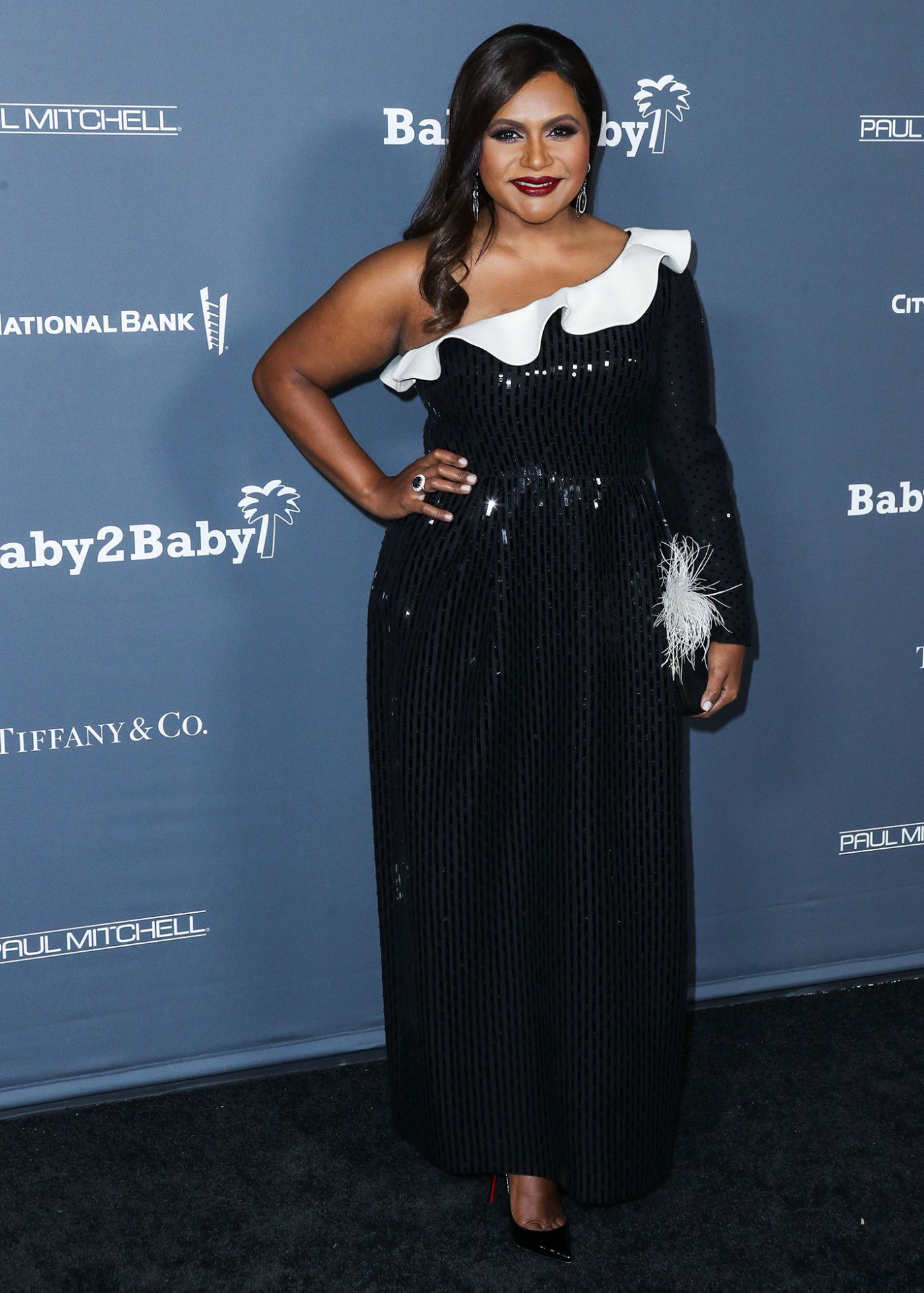 See Mindy Kaling’s Fierce Fashion Evolution: Photos | Us Weekly