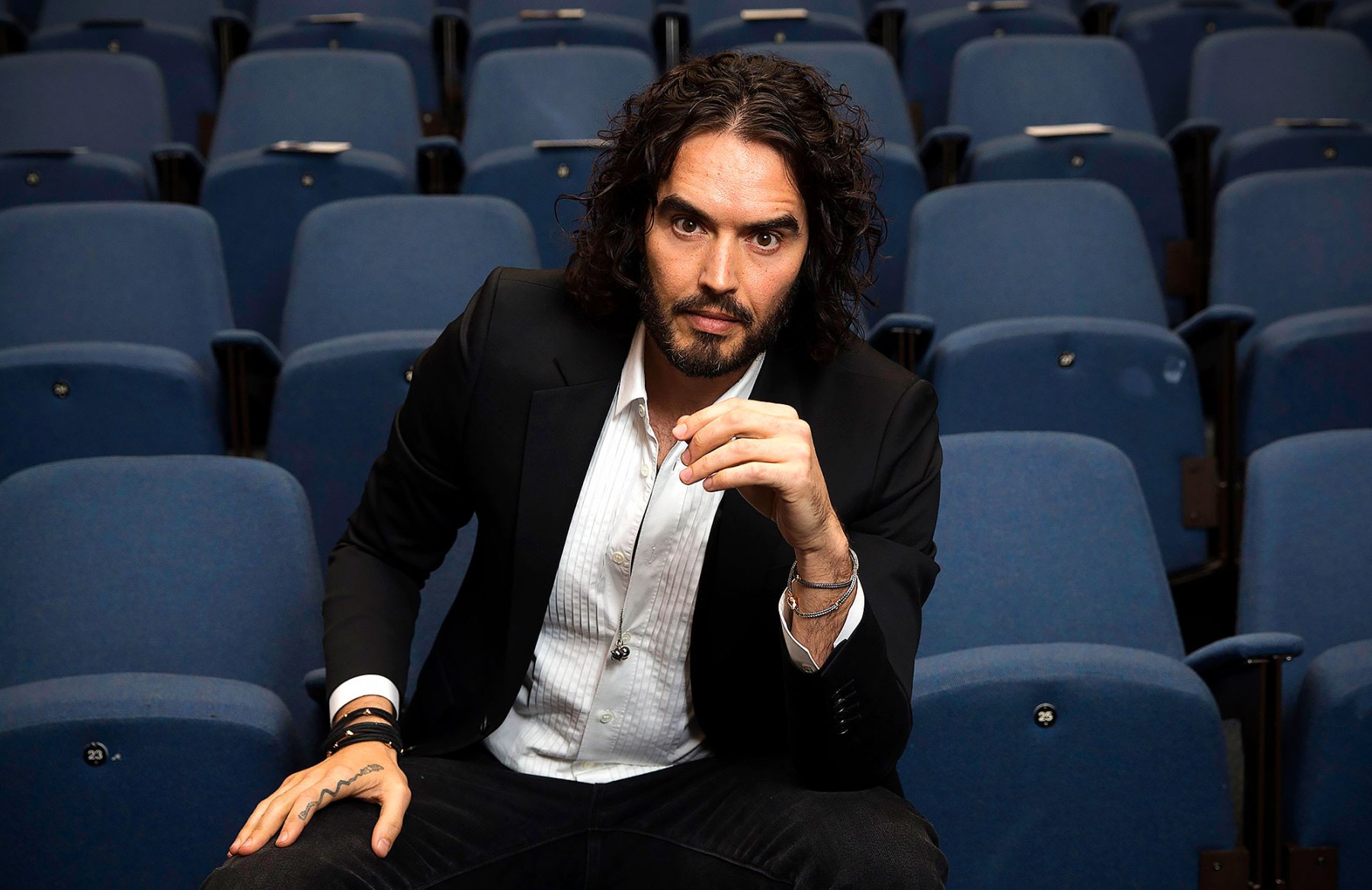What to Know About Russell Brand’s Sexual Assault Scandal