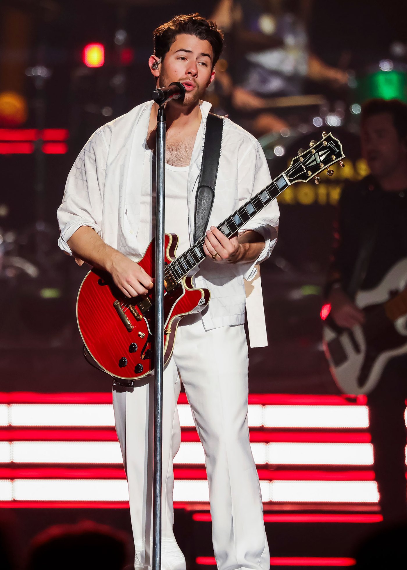 Nick Jonas Holds Back Tears While Performing ‘Little Bird’ Ballad | Us ...