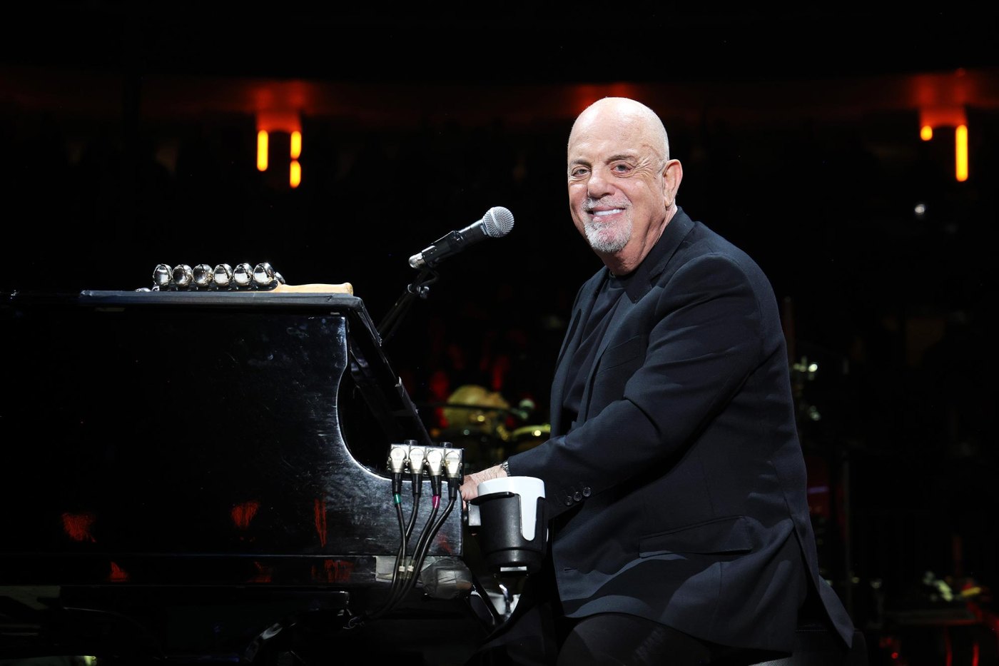 Billy Joel Performs 'Jingle Bells' With Daughters at MSG | Us Weekly
