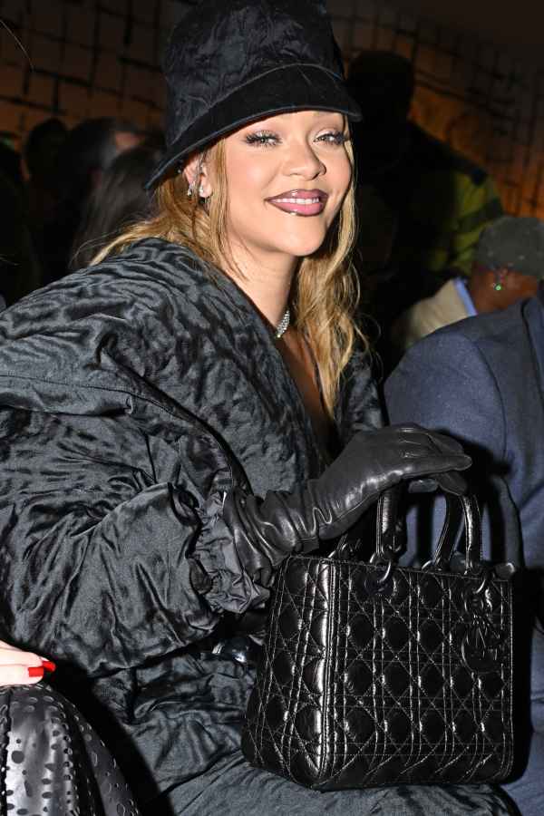 Rihanna Pairs a Belted Coat With a Baseball Cap at Paris Fashion Week ...