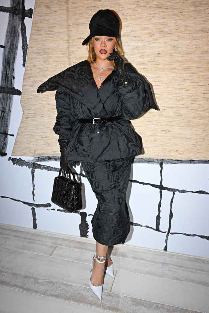Rihanna Pairs a Belted Coat With a Baseball Cap at Paris Fashion Week ...