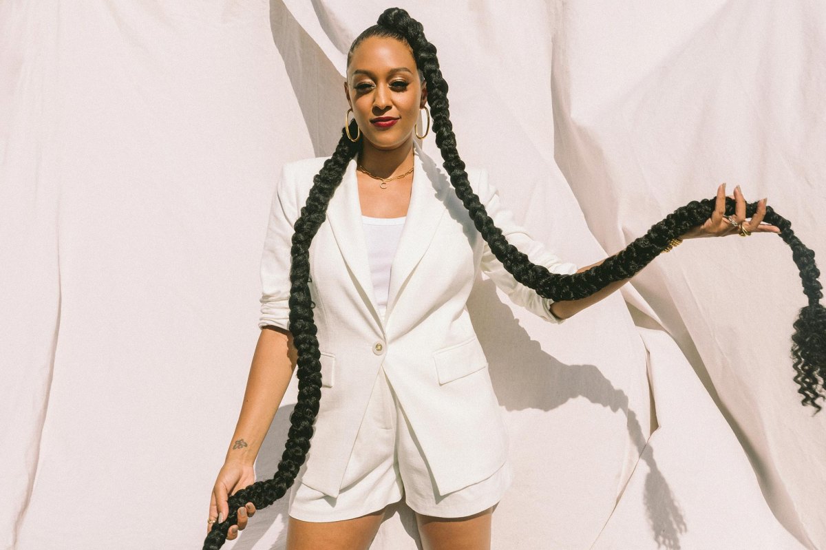 How Tia Mowry’s Natural Hair Journey Helped Start Her Business | Us Weekly