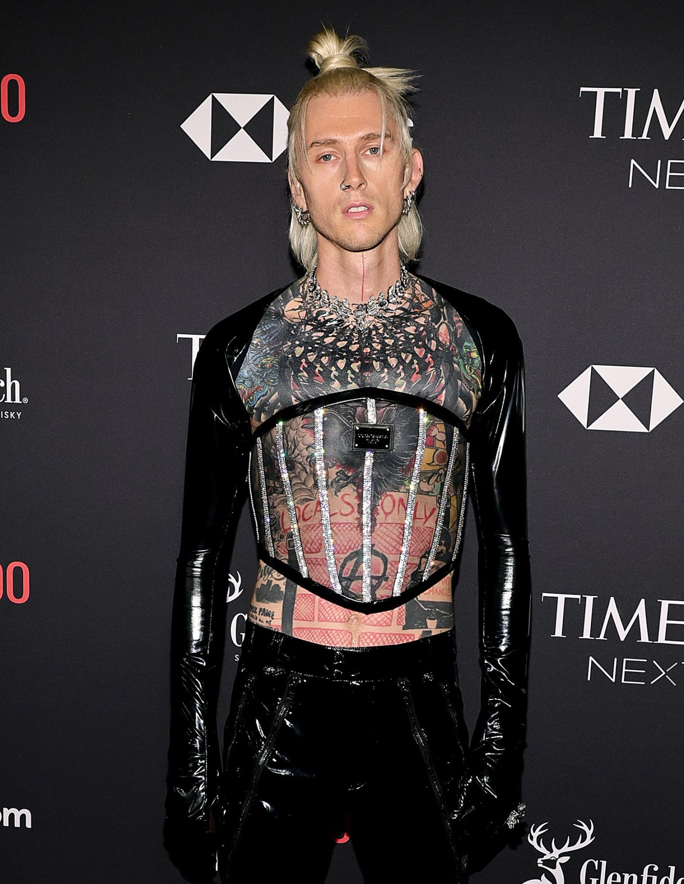 Machine Gun Kelly Covered Up His Tattoos In Dramatic Fashion Us Weekly Machine Gun Kelly Covered Up His Tattoos In Dramatic Fashion Us Weekly
