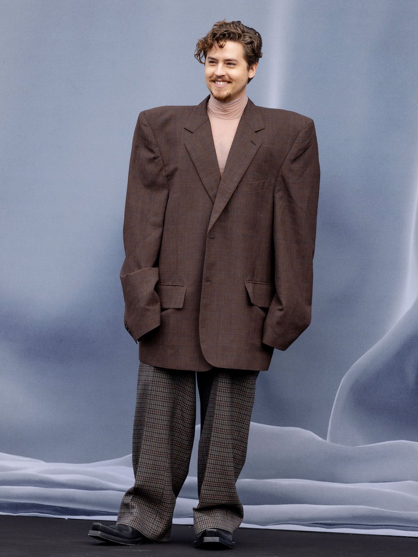 Cole Sprouse Wears Colossal Suit at Paris Fashion Week | Us Weekly