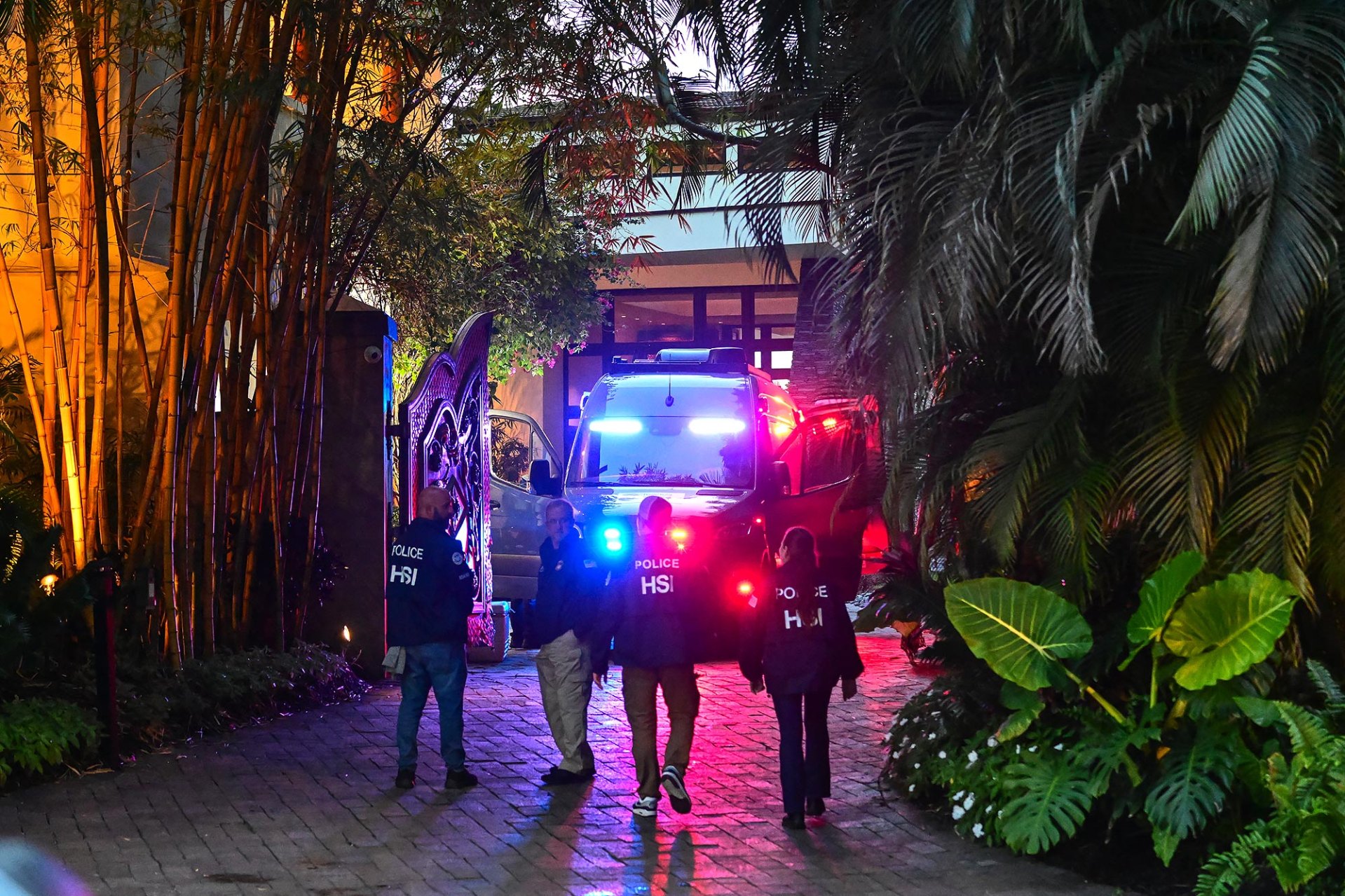 Diddy Takes Phone Call Outside His Miami Home 1 Week After Raid | Us Weekly