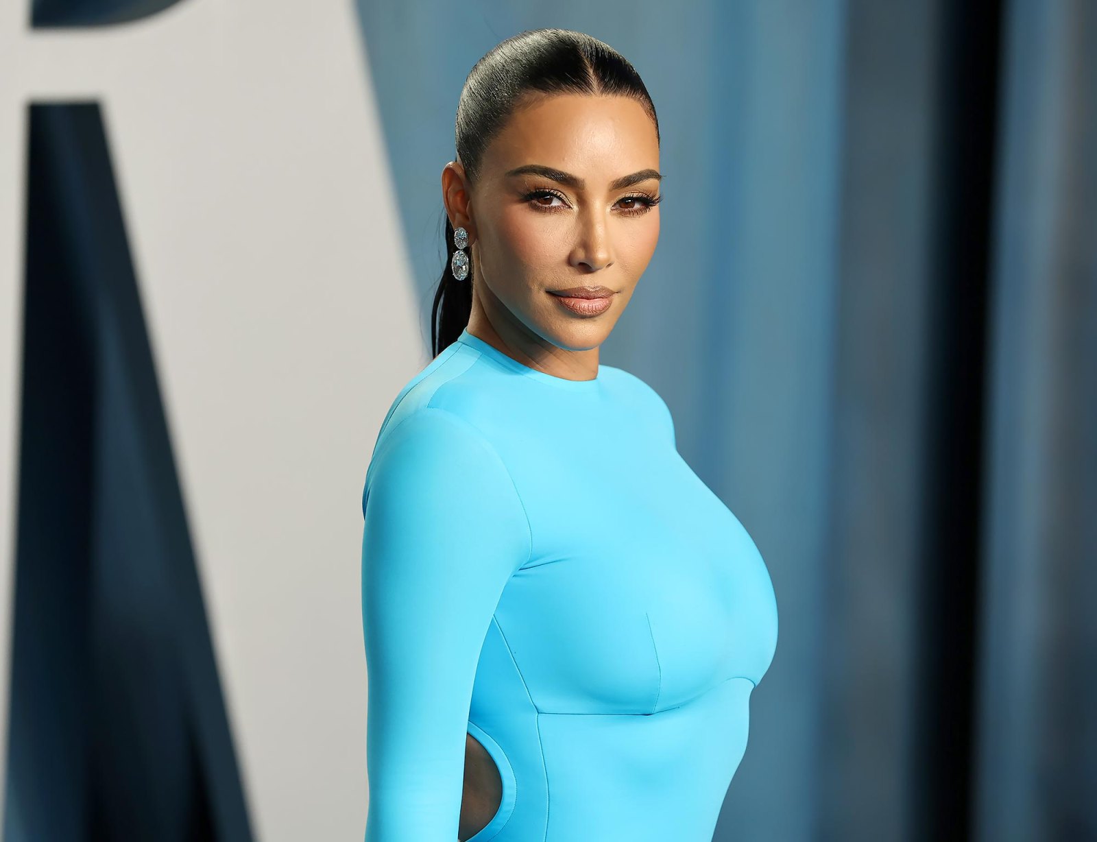 Kim Kardashian’s Daughter Chicago Attempts to Wear Mom’s Shoe Clutch ...
