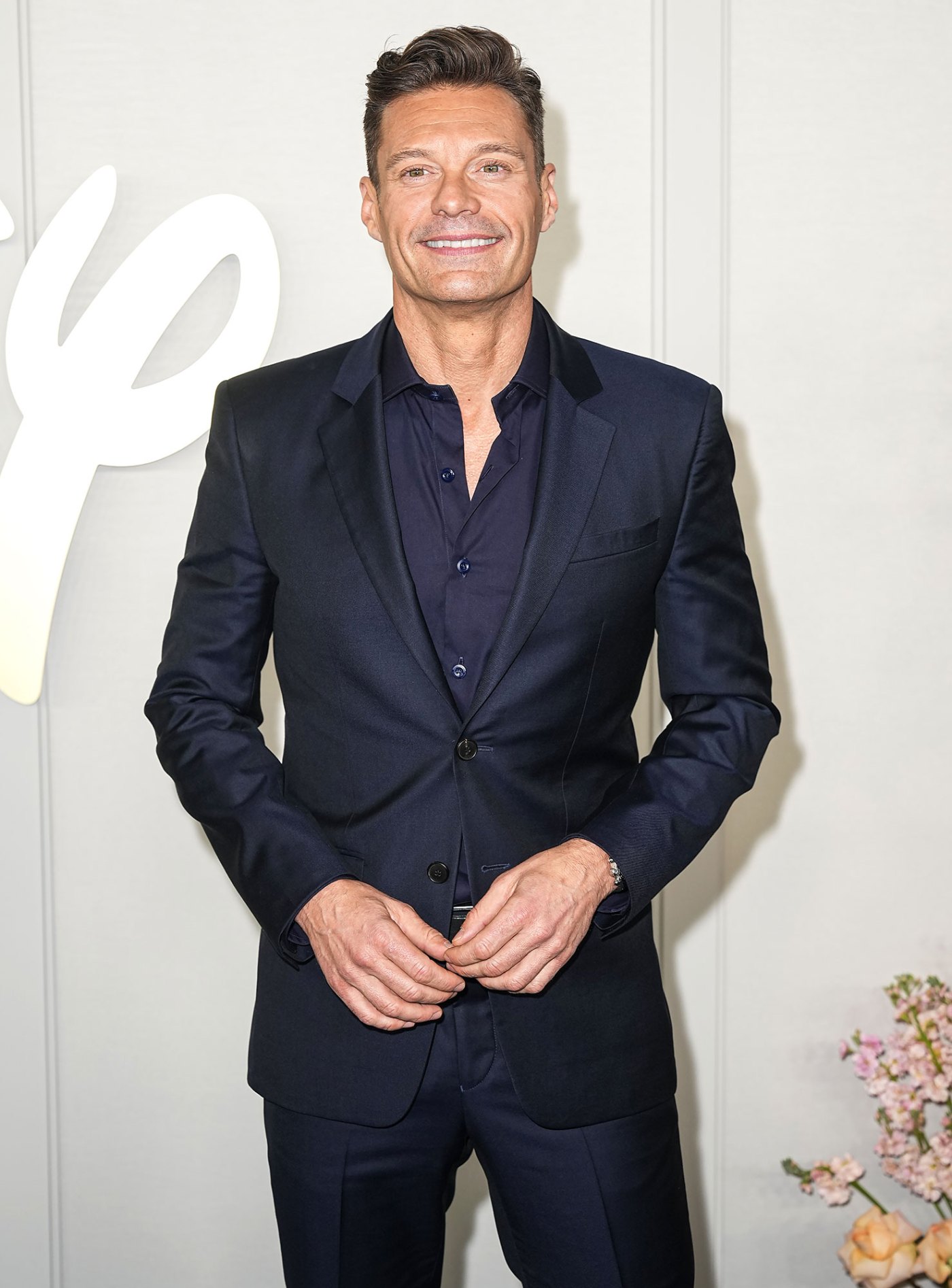 Pat Sajak Passes Wheel of Fortune Torch to Ryan Seacrest | Us Weekly