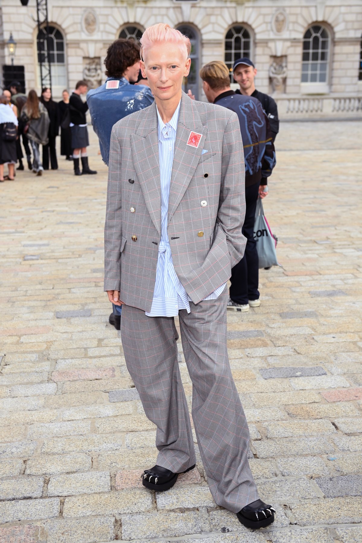 Tilda Swinton Pairs $1K Bear Claw Loafers With an Oversized Suit | Us ...