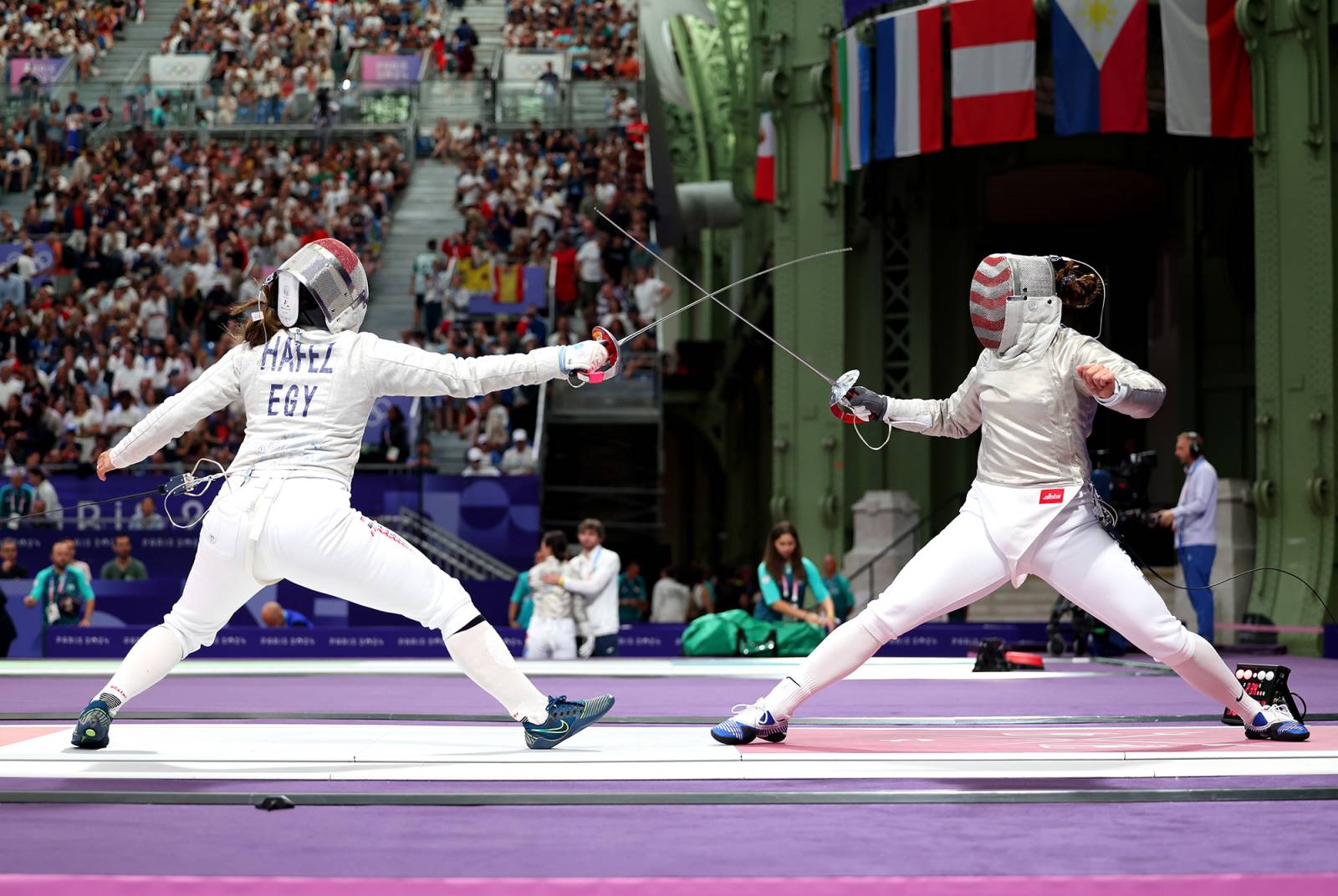Fencer Nada Hafez Competed in 2024 Olympics While 7 Months Pregnant ...