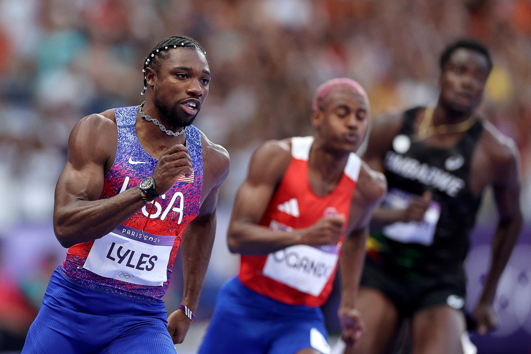 Noah Lyles: 5 Things to Know About Olympic Track and Field Star | Us Weekly