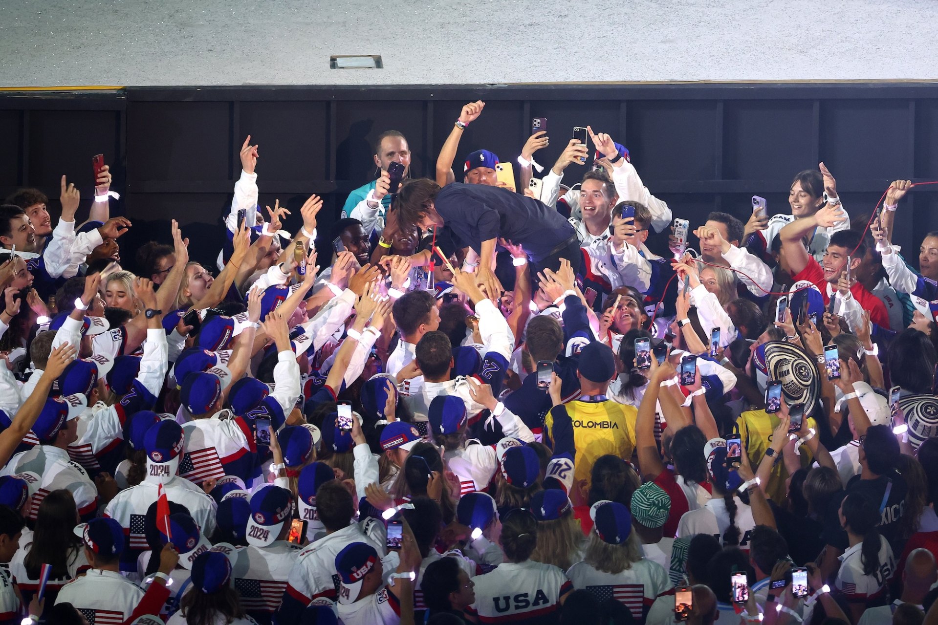 Phoenix's Thomas Mars Crowd Surfs on Team USA During Closing Ceremony ...