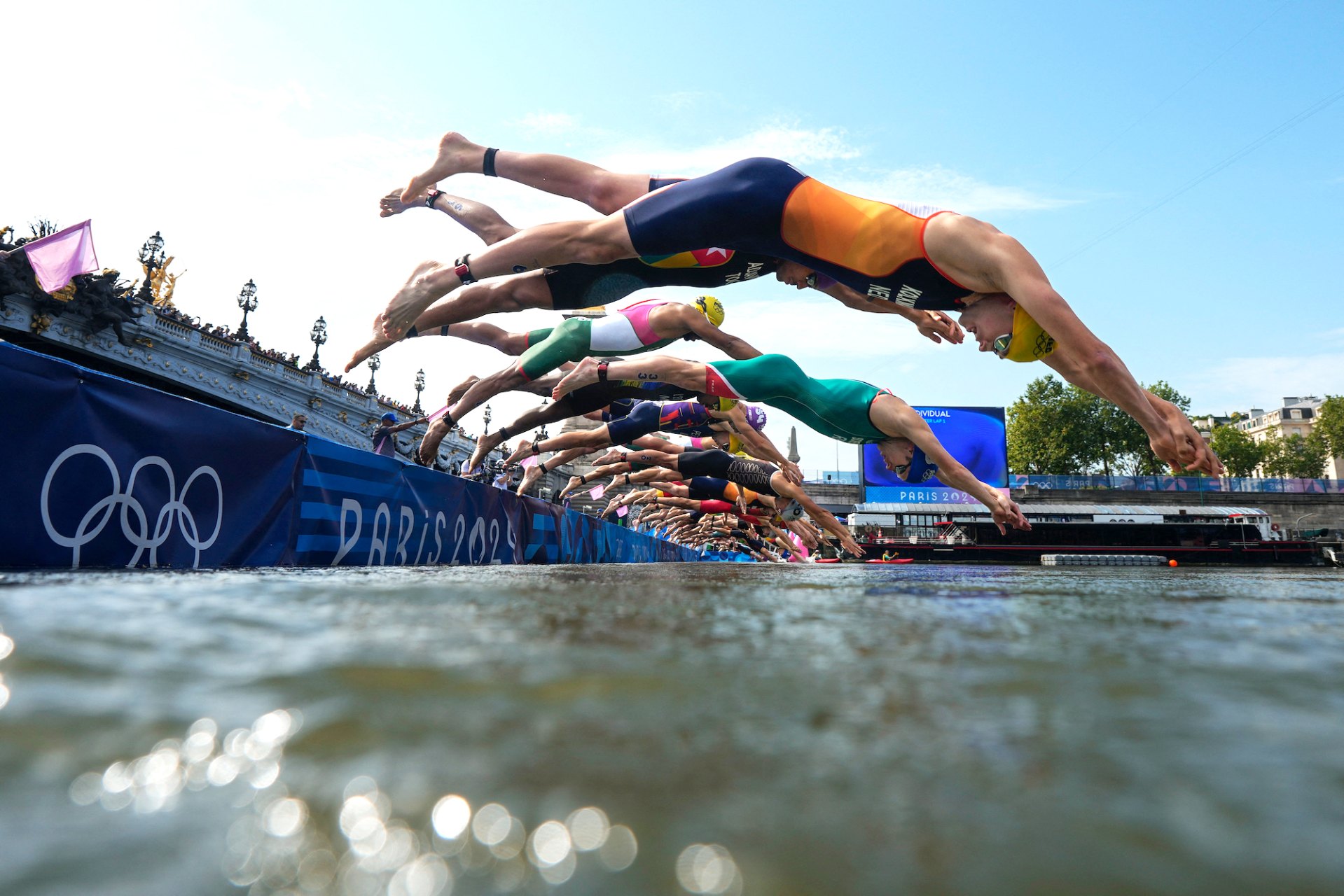 Olympic Swimmers Hope Coca-Cola Can Ward Off Bacteria in the Seine | Us ...