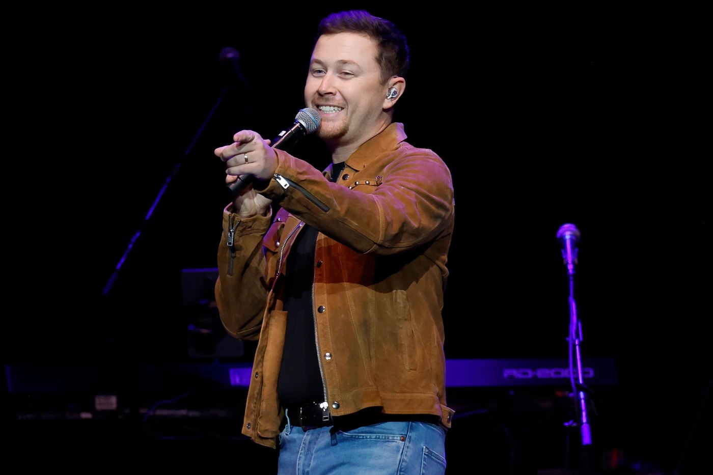 Scotty McCreery Stops Show After Man in Audience Hits a Woman | Us Weekly