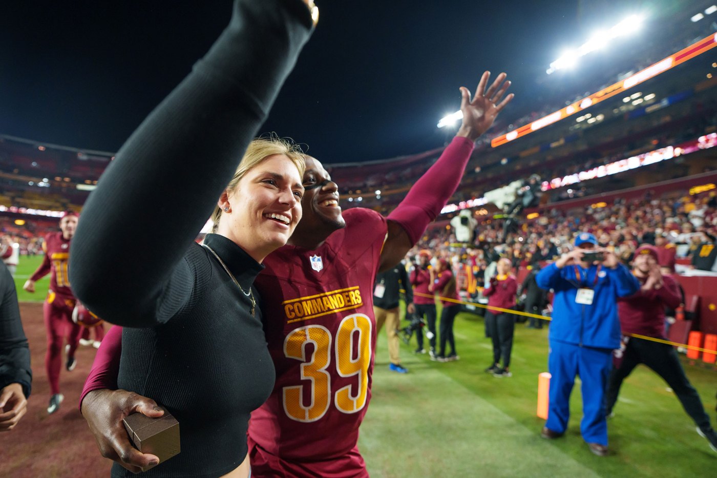 NFL's Jeremy Reaves Proposes to Girlfriend on the Field After Win | Us ...