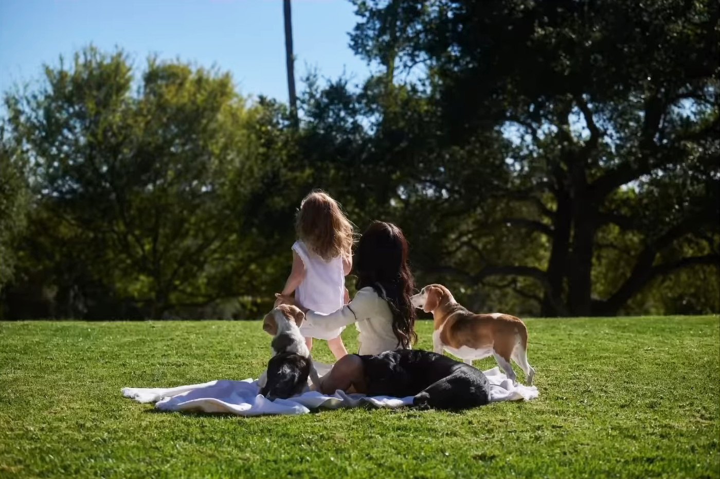 Meghan Markle's Kids Archie and Lili Play With Dogs in Throwback Pics ...