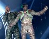 Flavor Flav Wants Taylor Swift's Thoughts on His Masked Singer Stint ...