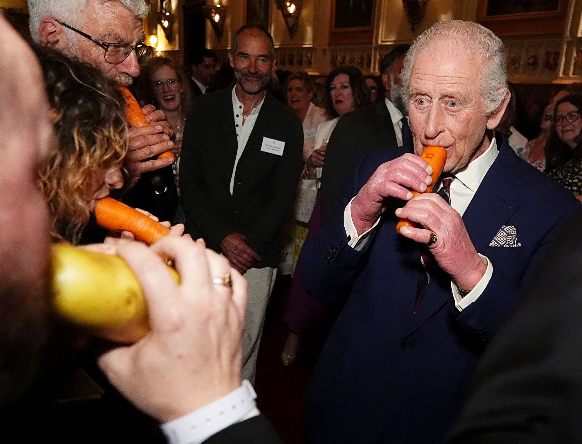 King Charles Plays a Carrot Instrument With London Vegetable Orchestra ...