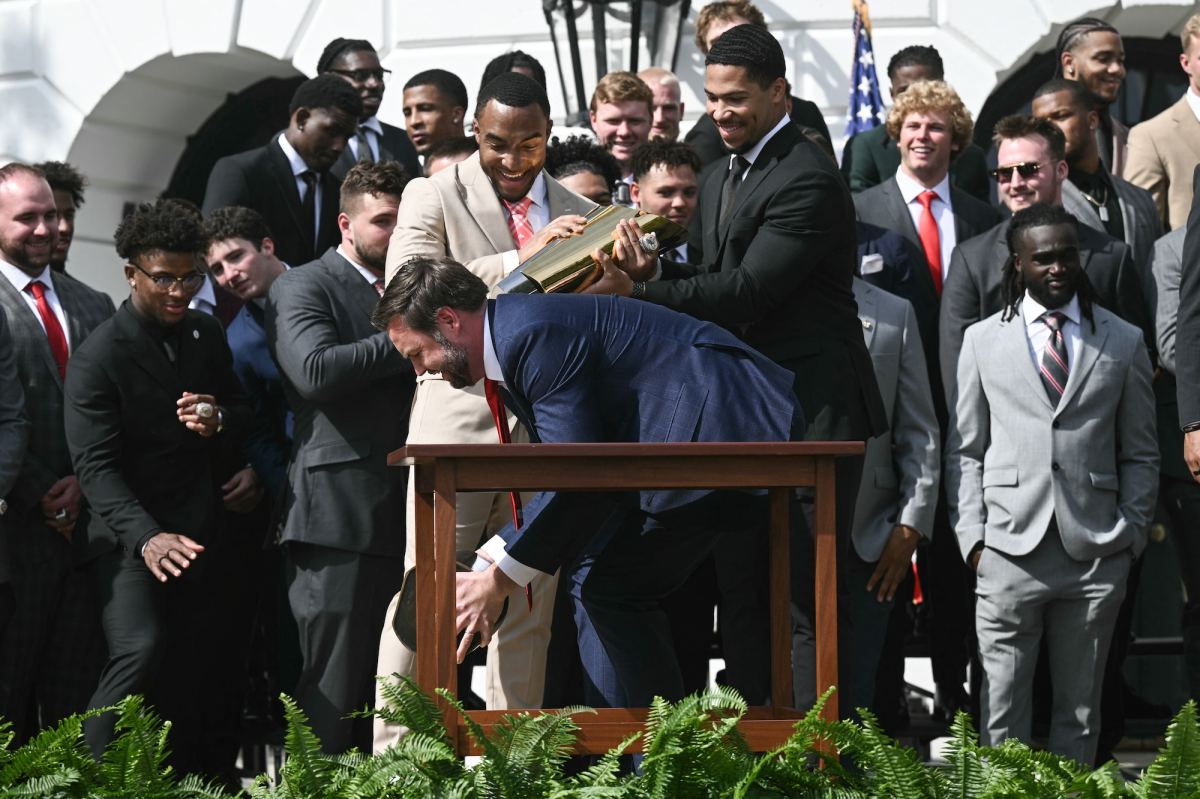 JD Vance Breaks Ohio State Trophy at White House Celebration | Us Weekly