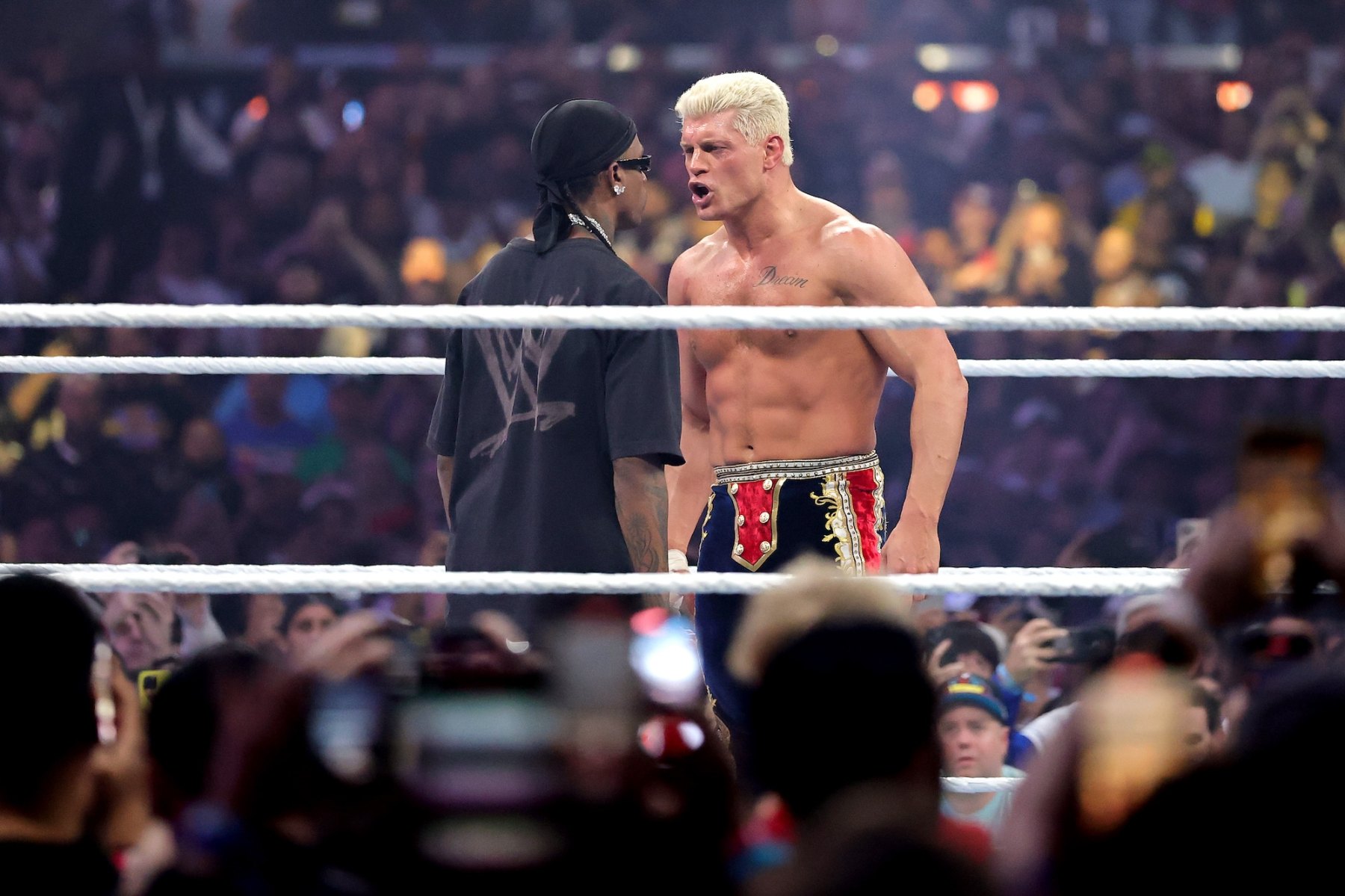 Travis Scott Gets Laid Out At WrestleMania 41 by WWE's Cody Rhodes | Us ...
