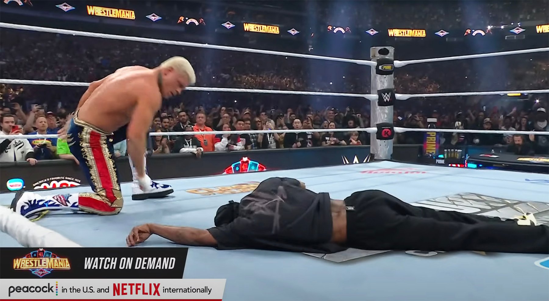 Travis Scott Gets Laid Out At WrestleMania 41 by WWE's Cody Rhodes | Us ...