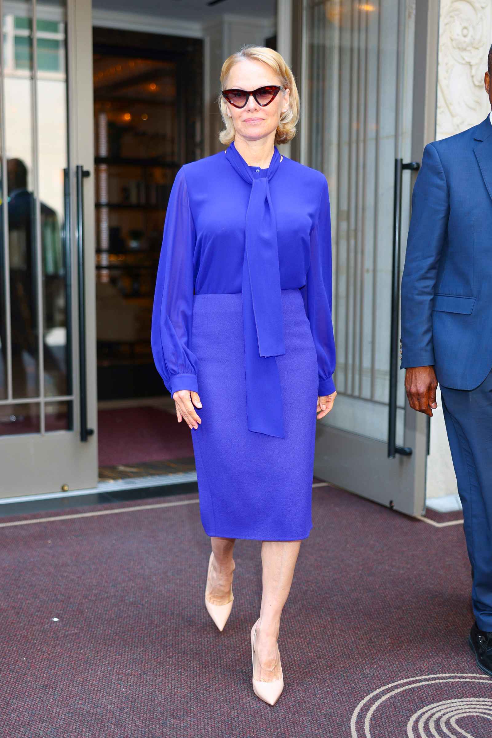 Love Pamela Anderson’s Royal Blue Blouse? Get the Look for $26 | Us Weekly