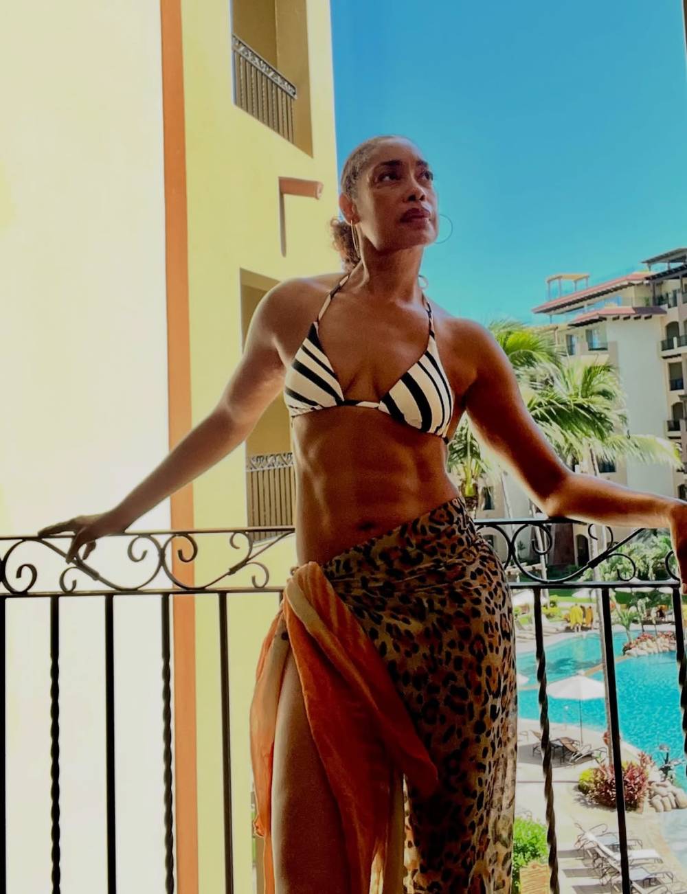 Gina Torres Drops Jaws With Ab Baring Bikini Photos On Vacation Us Weekly