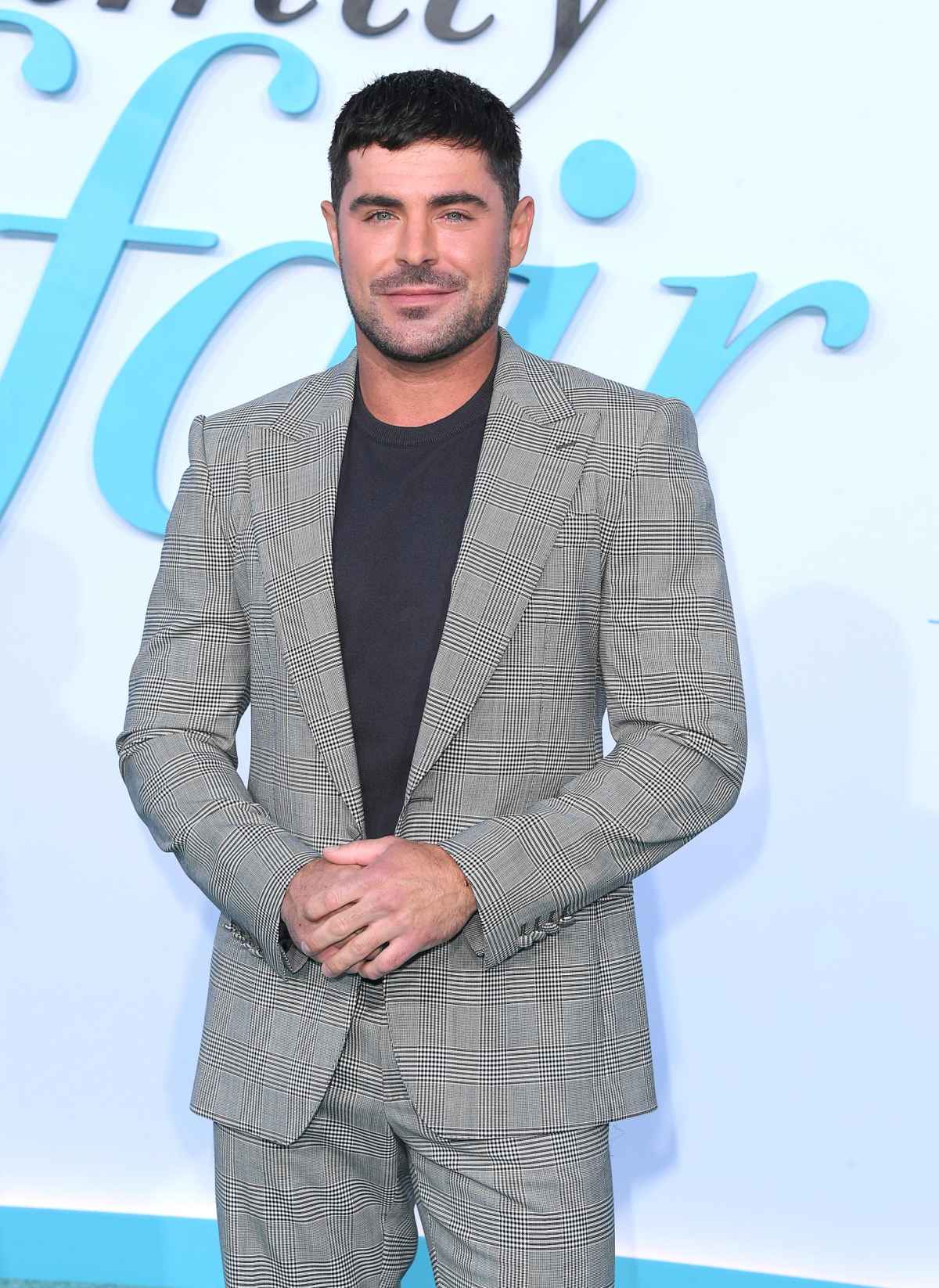 What's the Truth About Zac Efron Fake Tan, Plastic Surgery Prada Ads ...