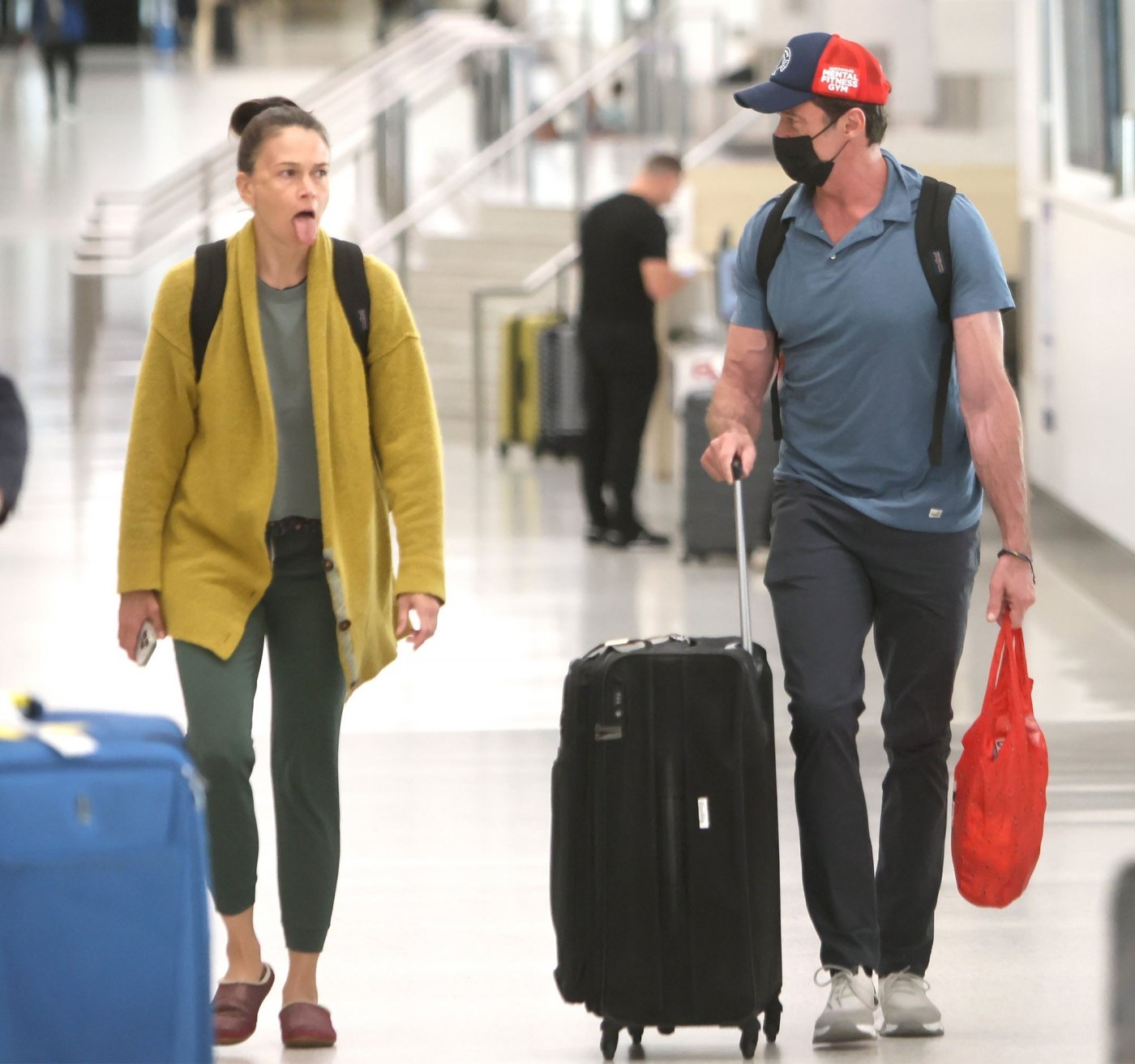 Hugh Jackman and Sutton Foster Keep It Flirty at LAX Airport | Us Weekly