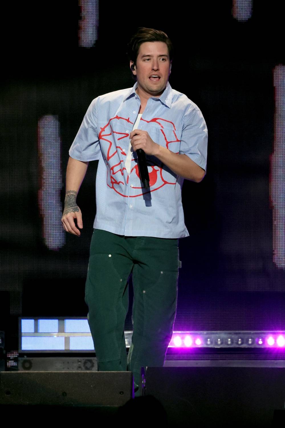 Big Time Rush's Logan Henderson Taken to ER After Onstage Fall | Us Weekly