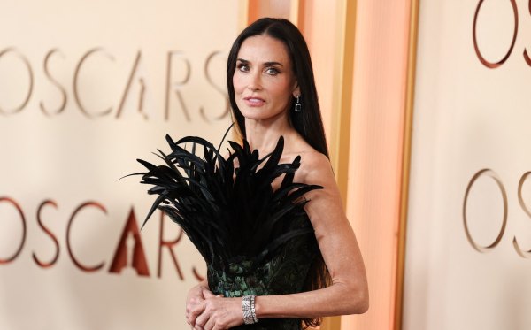 Demi Moore Rocks Feathered Dress on 2026 Oscars Red Carpet