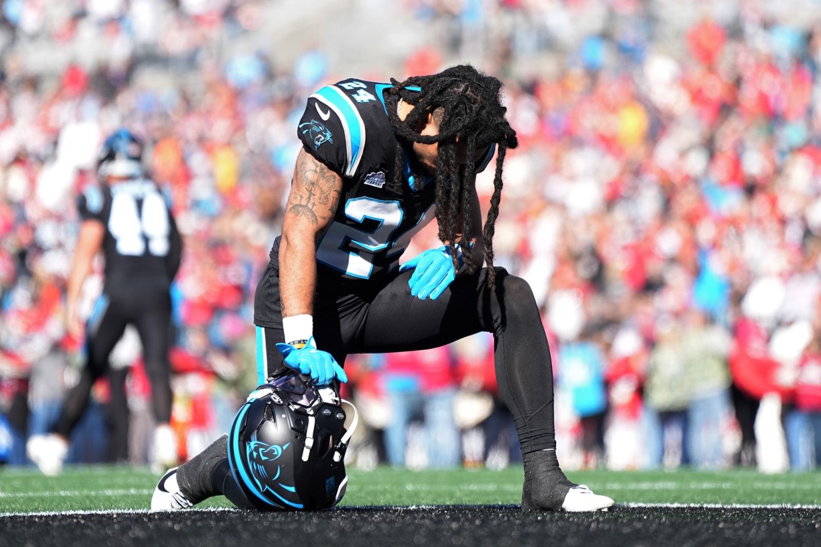 NFL's Jonathon Brooks Baptized After Dad's Death, ACL Tears