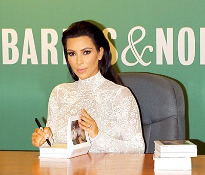 Kim Kardashian Wears Demure Turtleneck, Pencil Skirt at Book Signing ...
