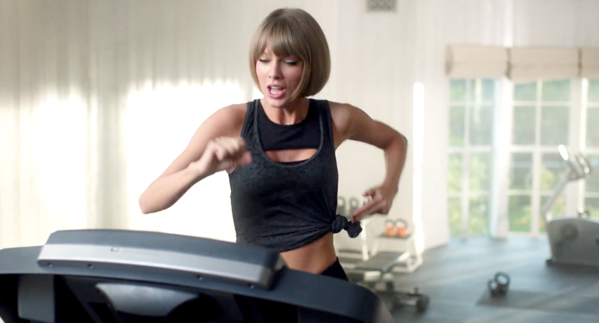 Taylor Swift Raps, Falls on Treadmill in New Apple Music Ad