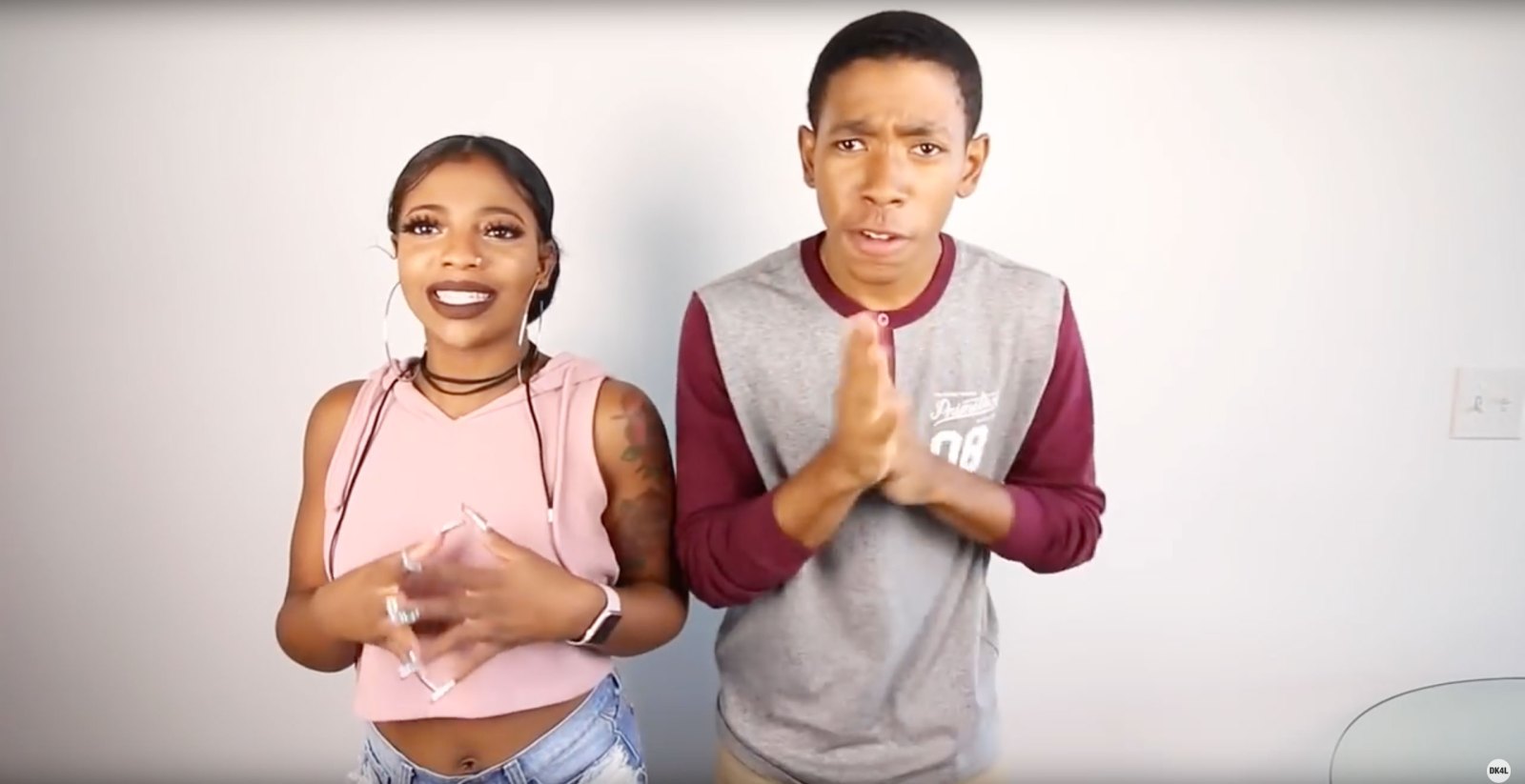 Watch This Couple Attempt to Put On 100 Layers of Clothing | Us Weekly