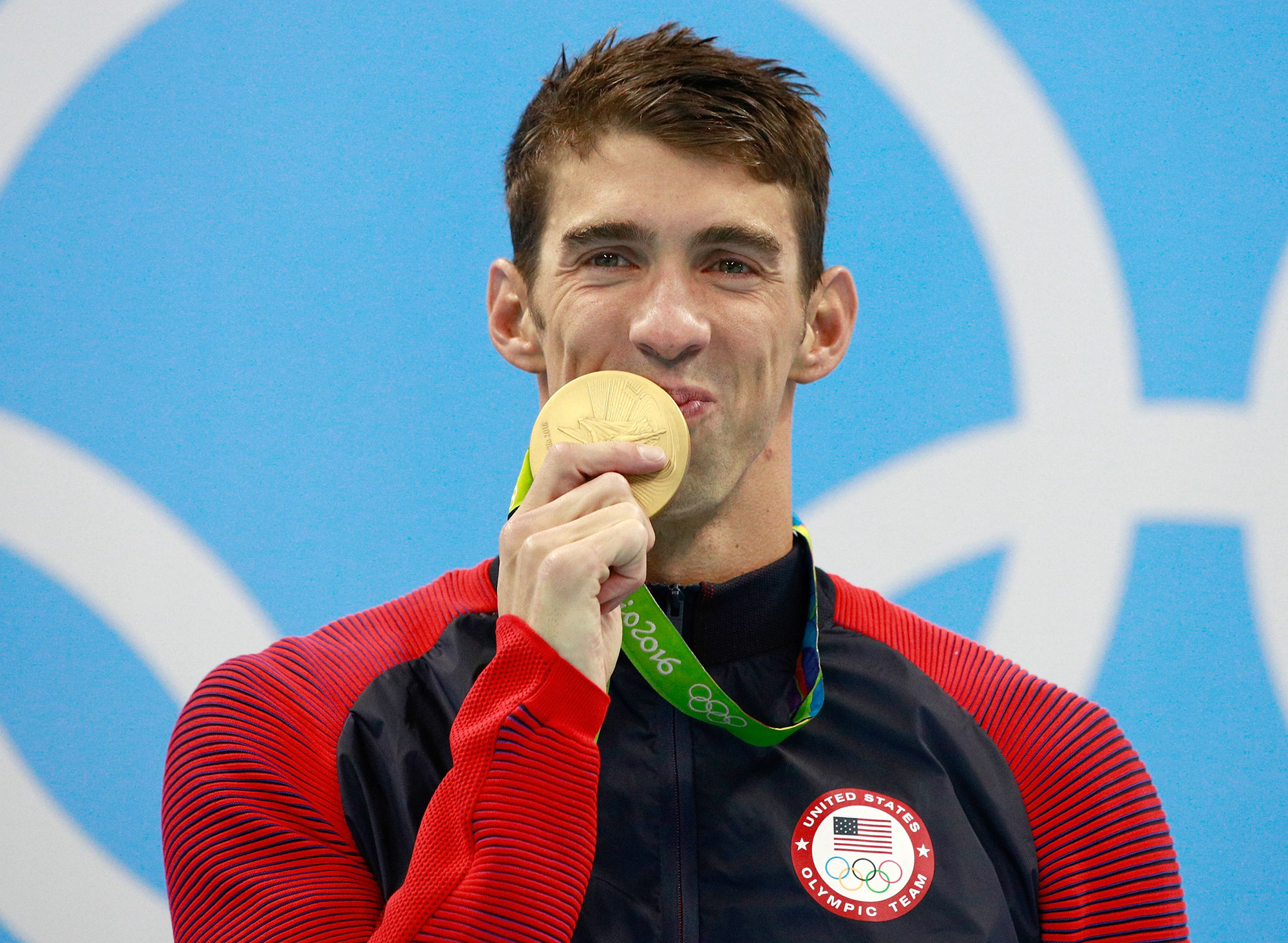 Michael Phelps Wearing 22 Medals
